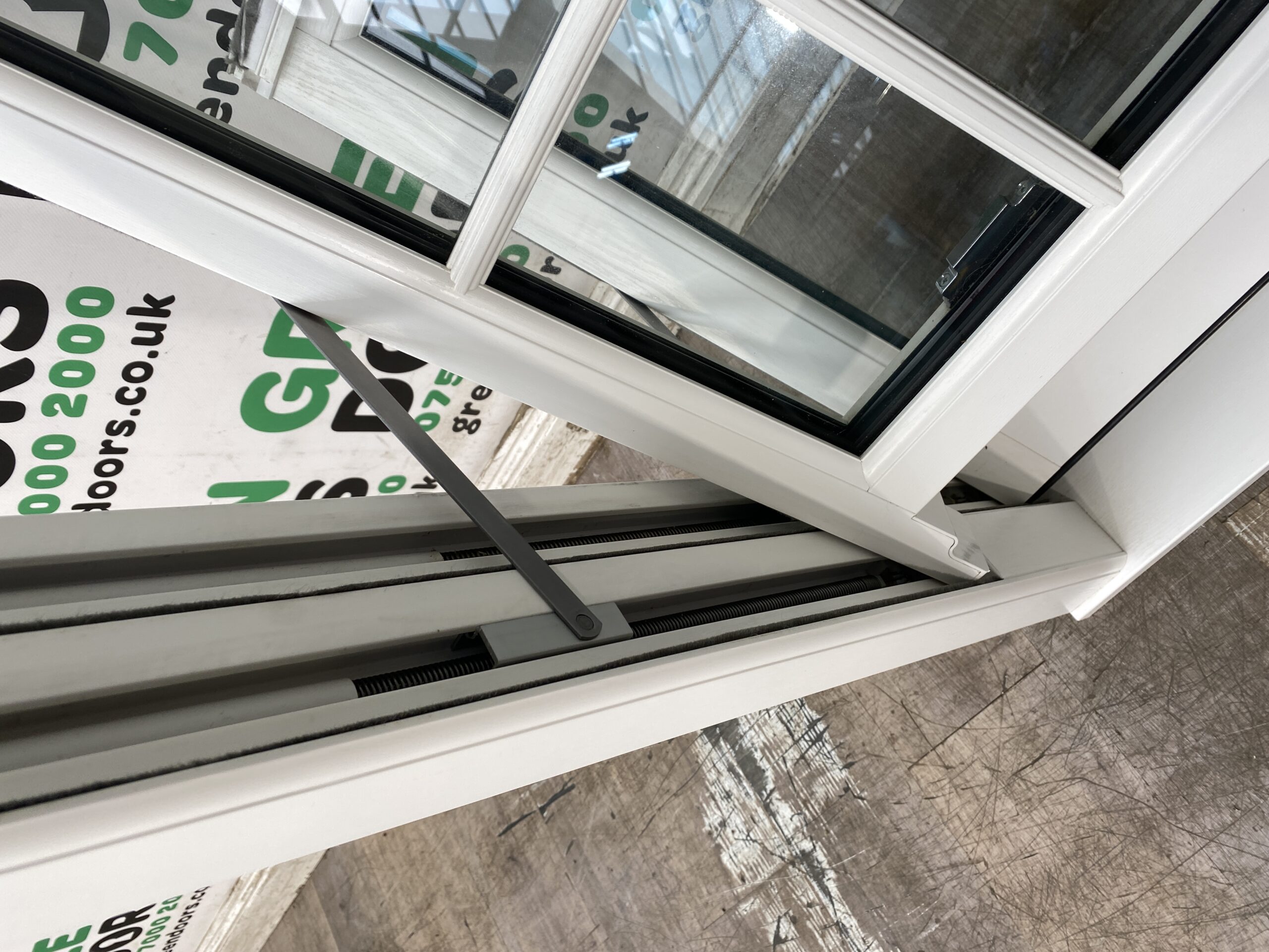 White uPVC Box sash window | Green doors
