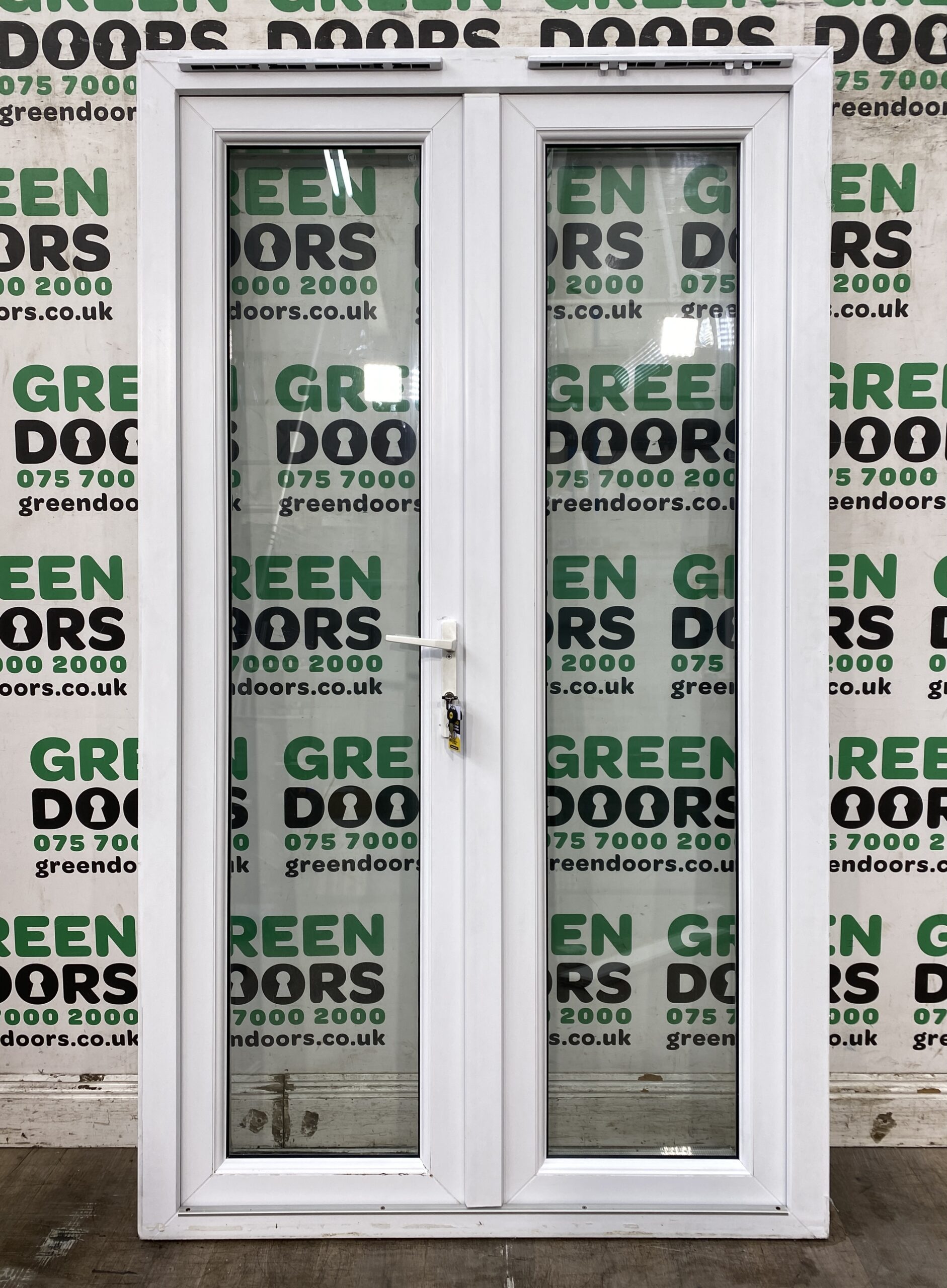 White uPVC French doors | Green doors