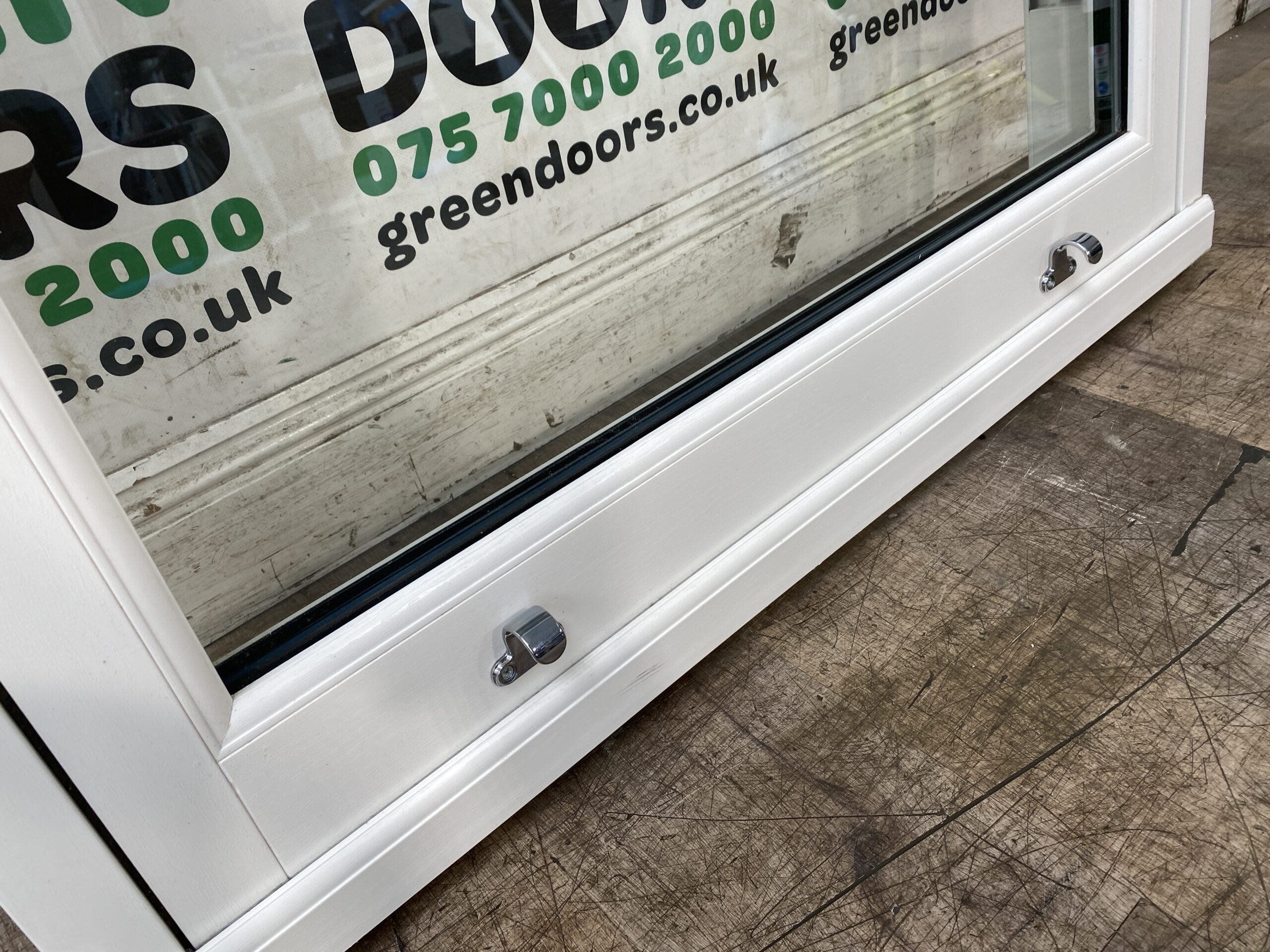 White uPVC Box sash window | Green doors