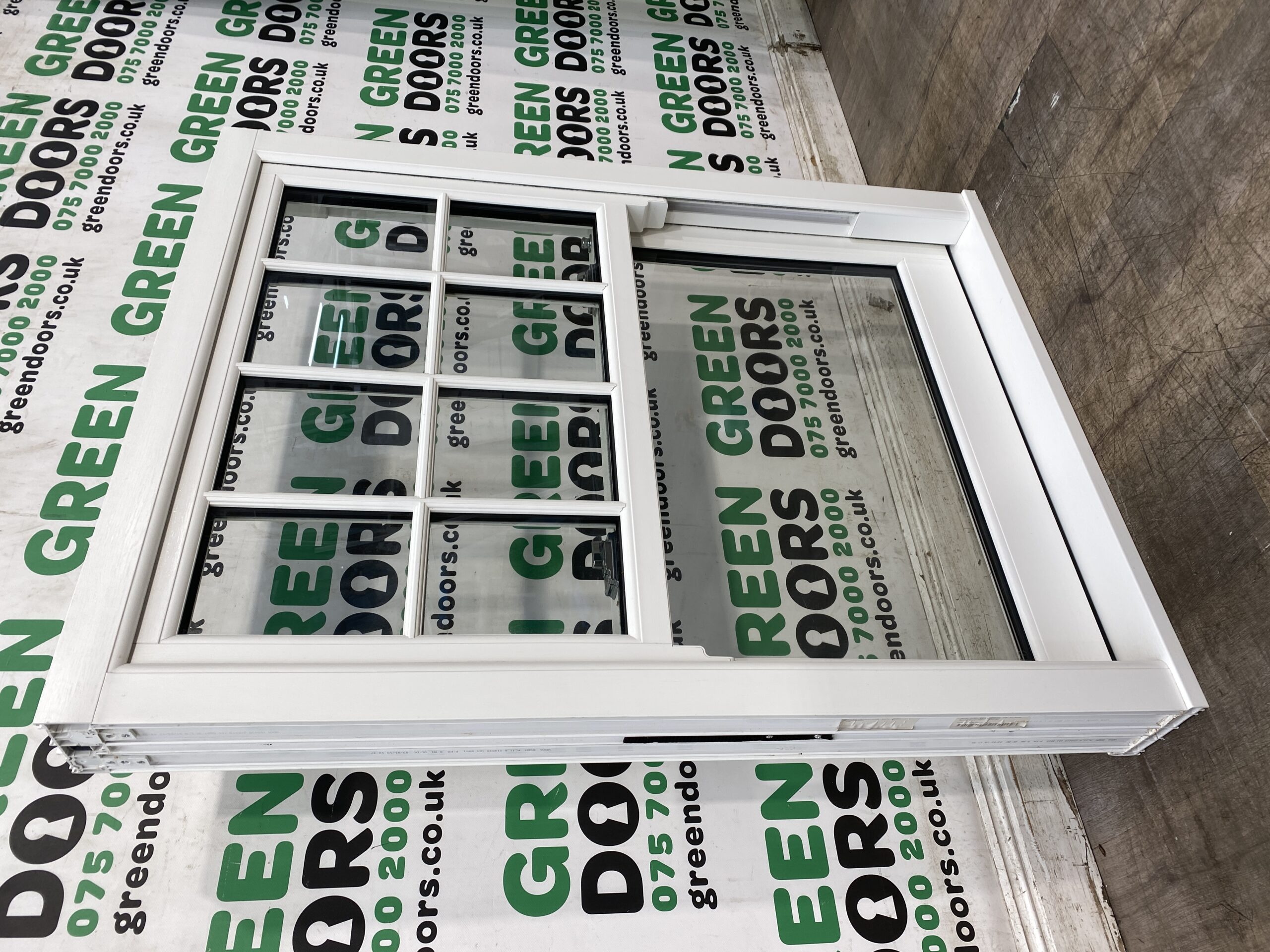 White uPVC Box sash window | Green doors