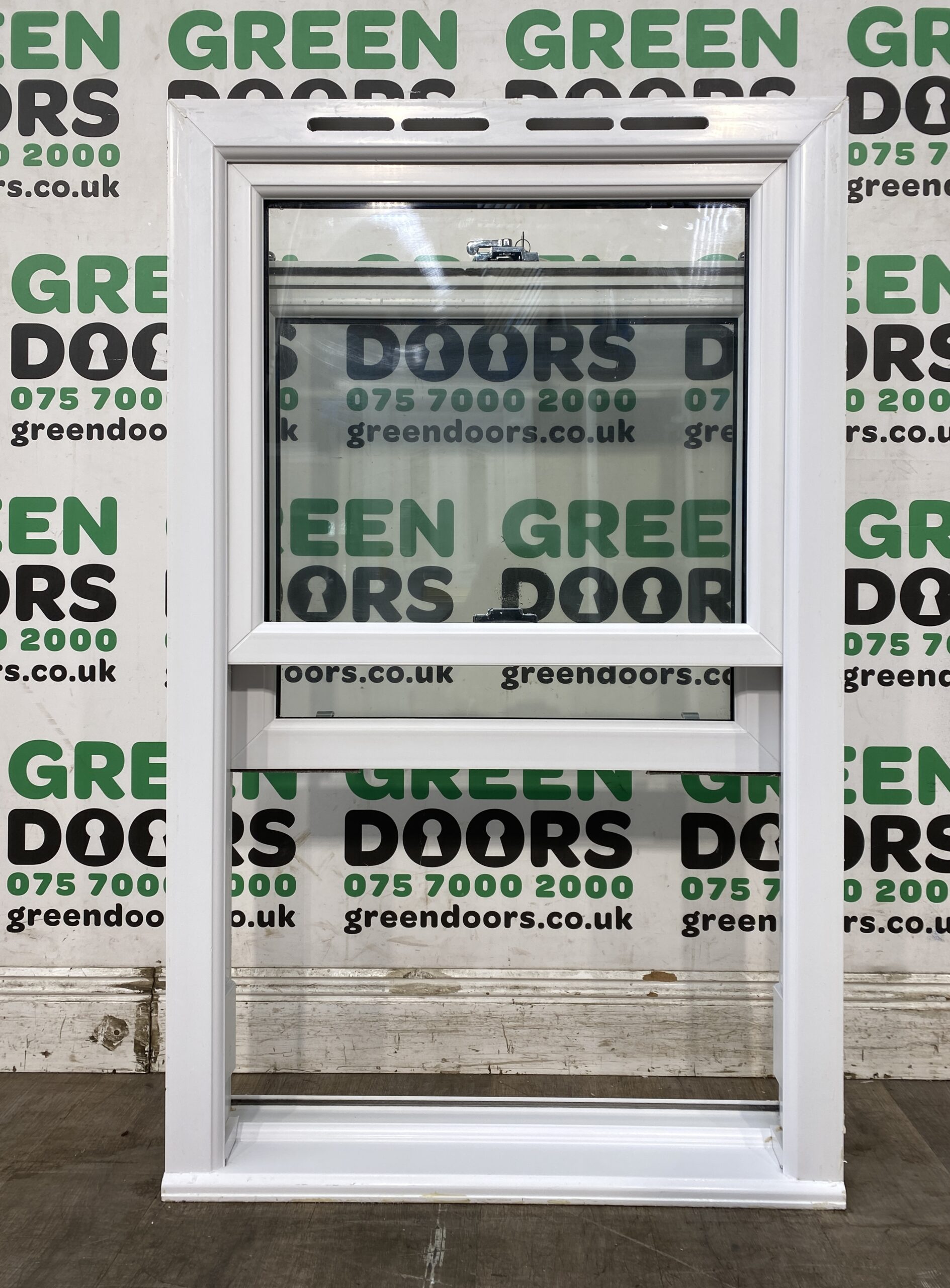 White uPVC Box sash window | Green doors