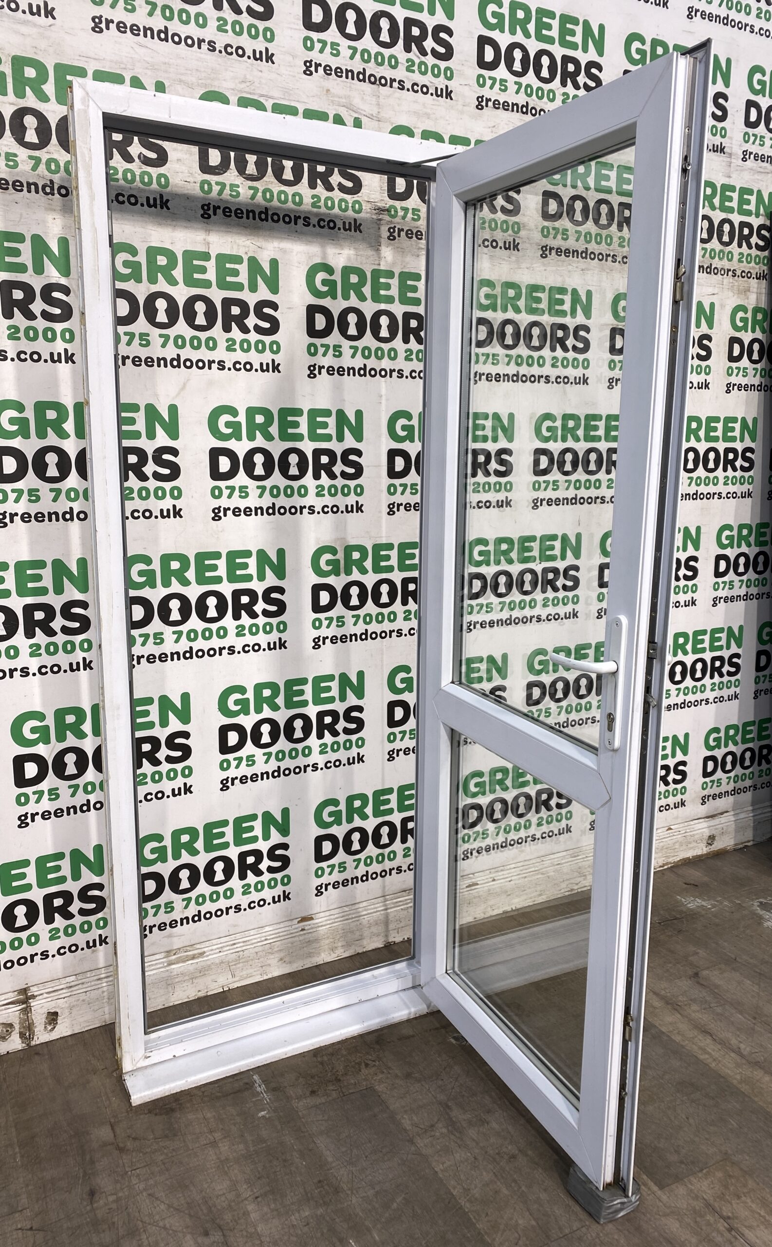White uPVC Back door | Green doors