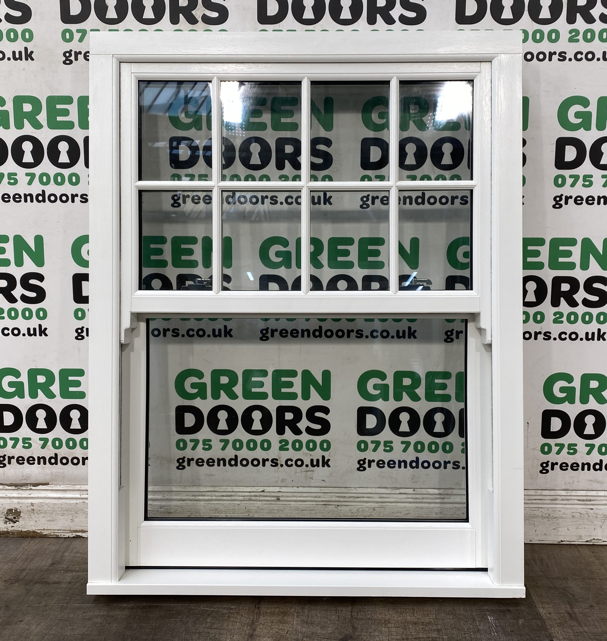 White uPVC Box sash window | Green doors