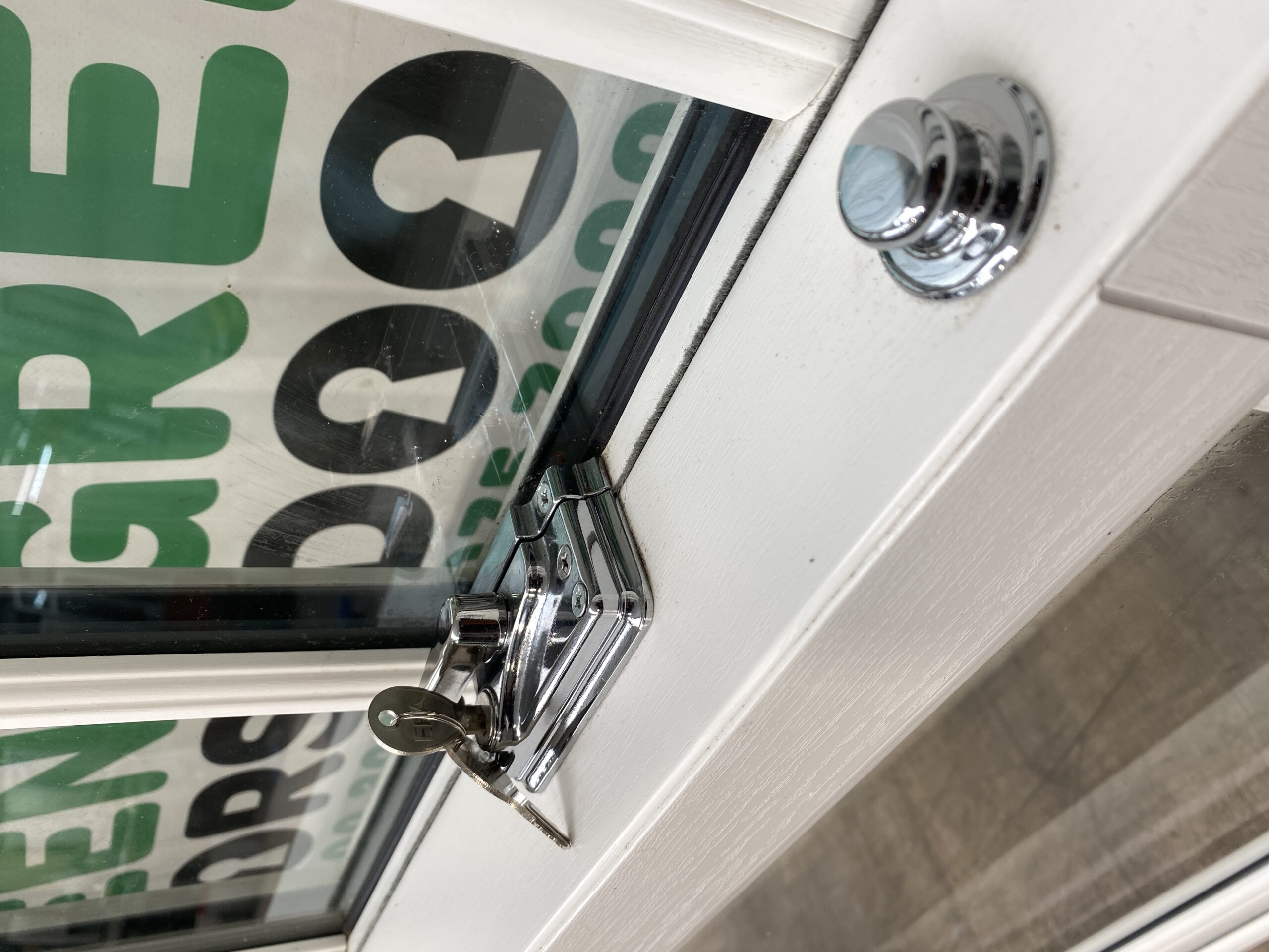 White uPVC Box sash window | Green doors