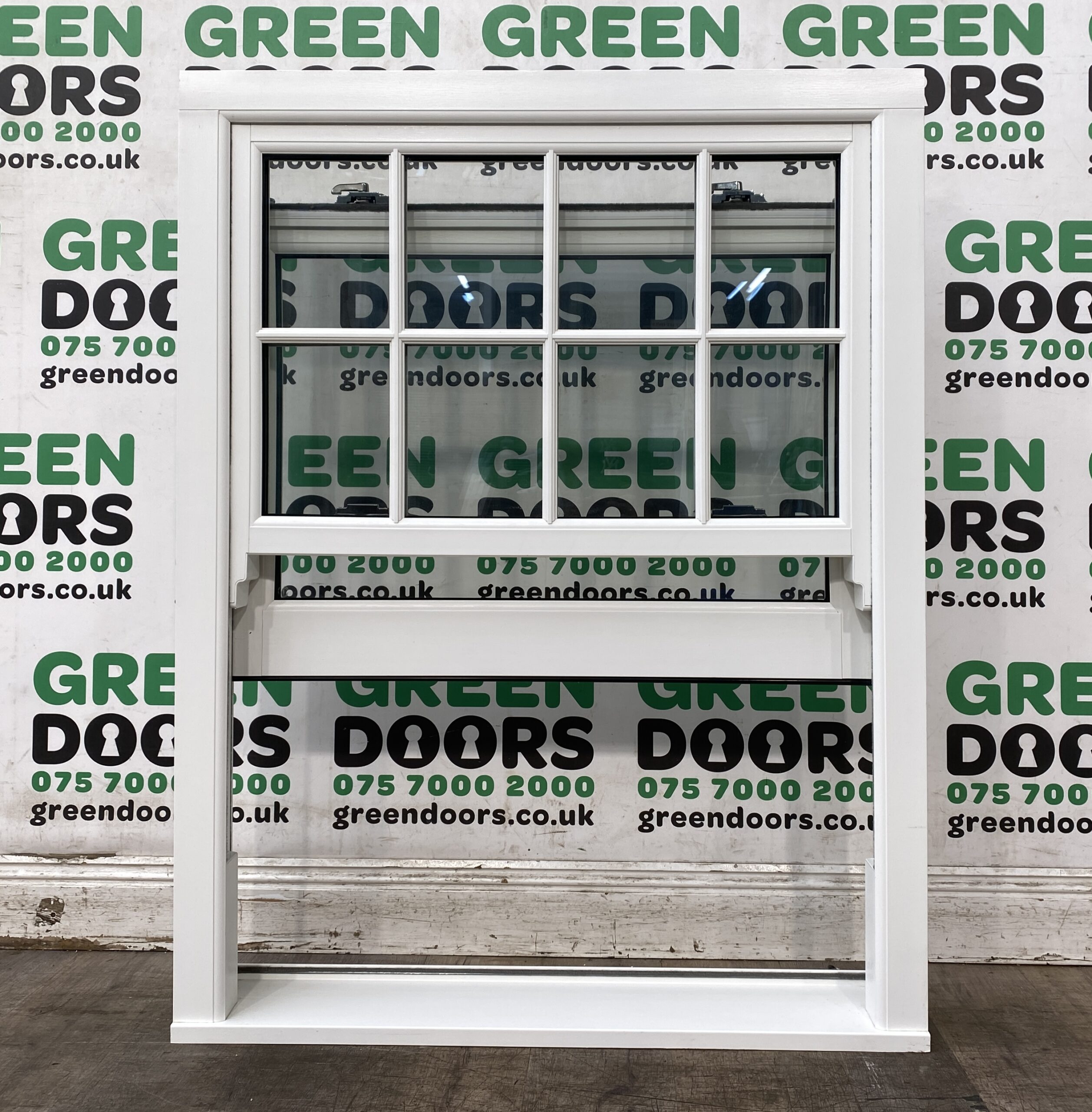 White uPVC Box sash window | Green doors