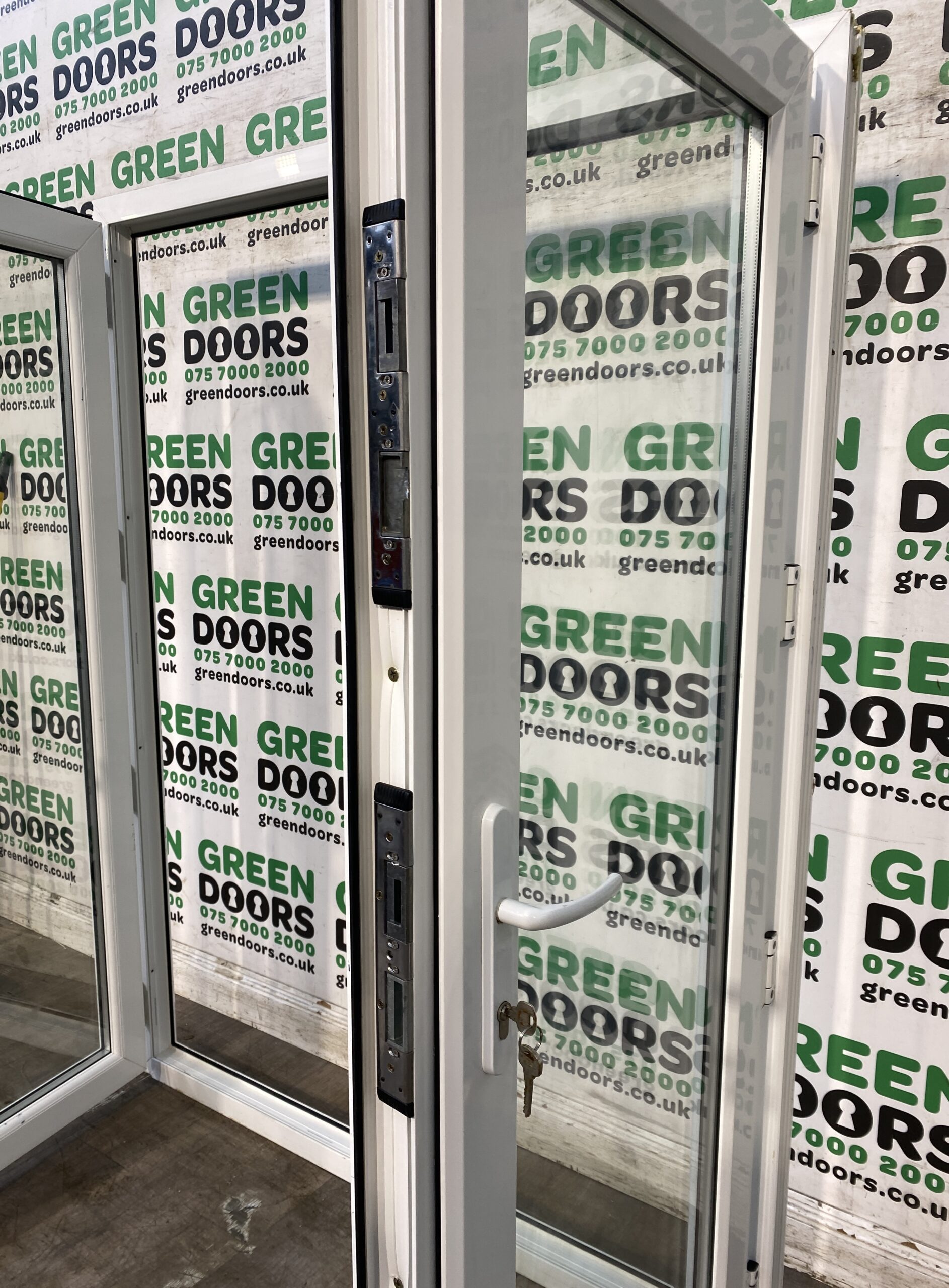 White uPVC French doors | Green doors