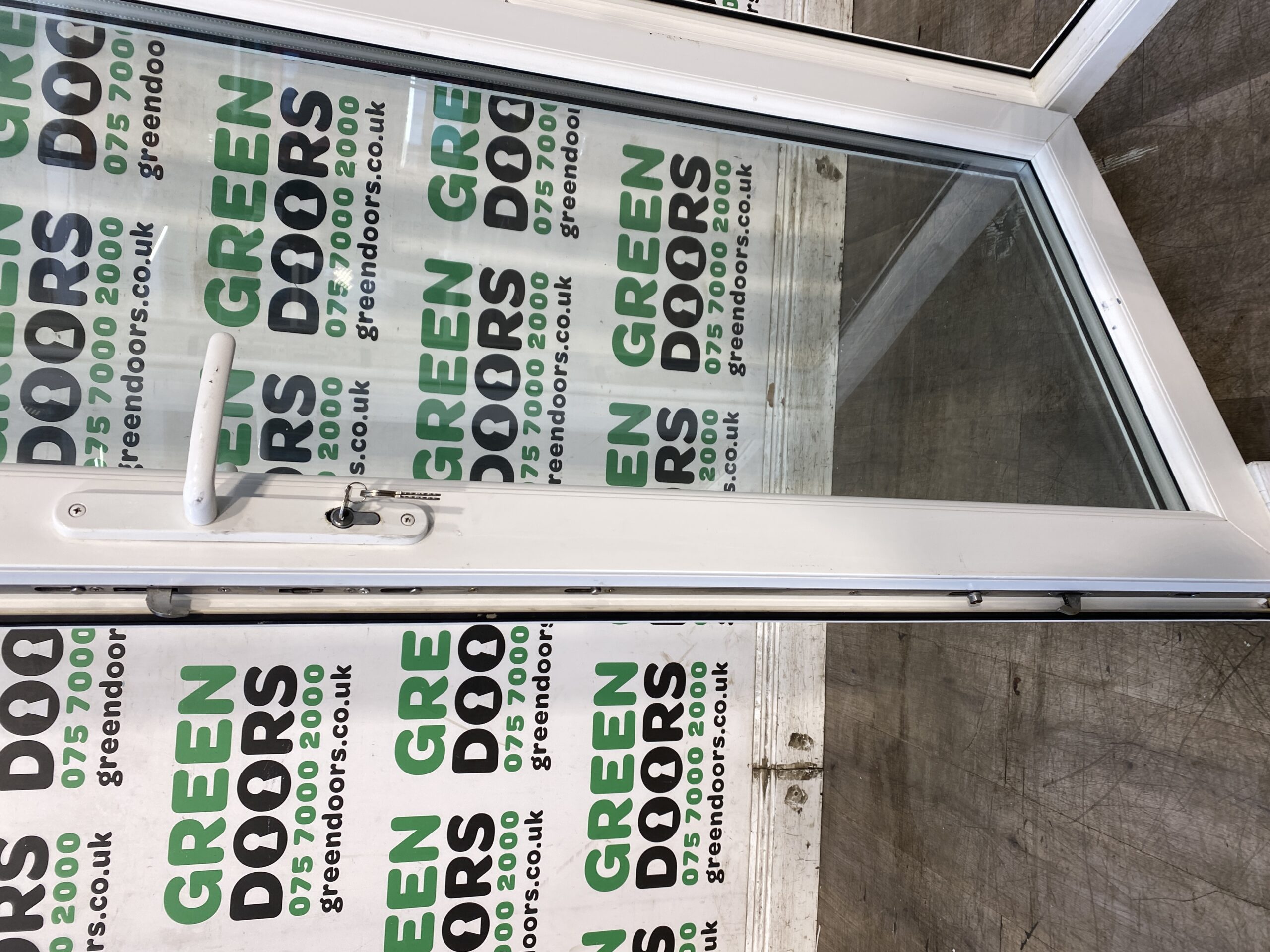 White uPVC French doors | Green doors