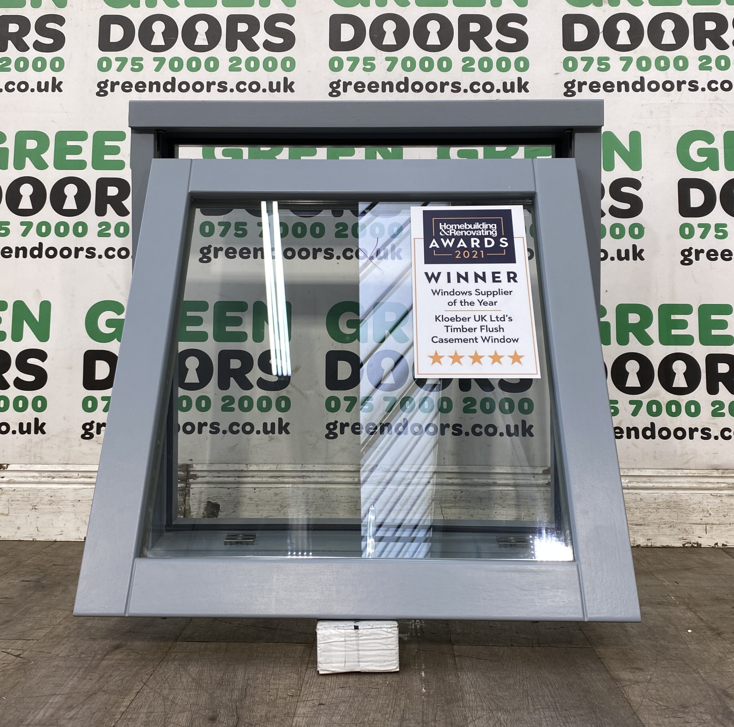 Wooden Window | Green doors